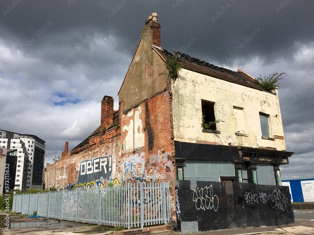 Urban decay - a derelict house with in a city suburb awaiting ...