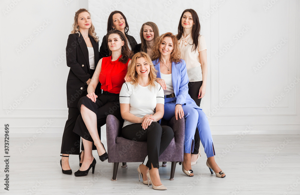 Happy women work team employees group looking at camera posing in ...