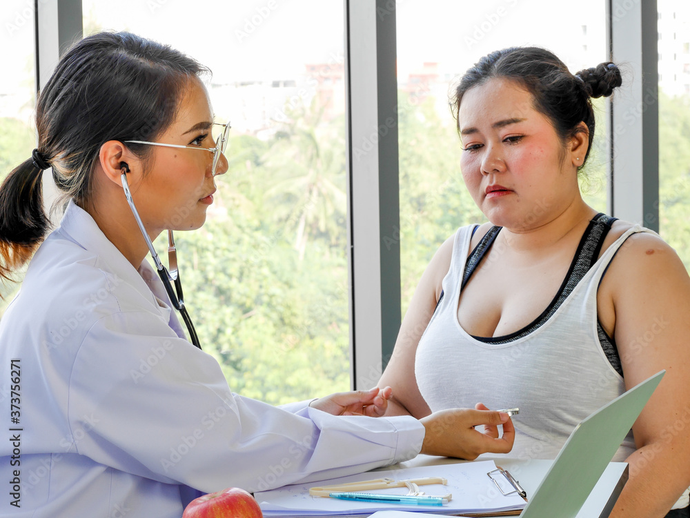 fat overweight Asian woman got advise from expert medical doctor in ...