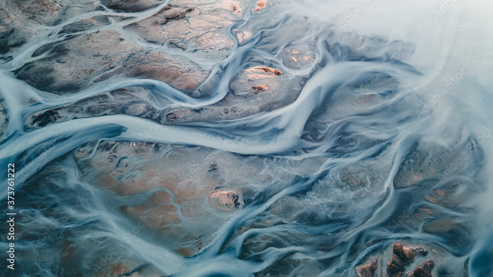 A glacial rivers from above. Aerial photograph of the river streams ...