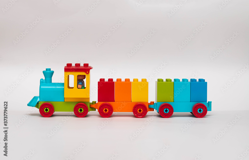 Children's plastic constructor steam locomotive. Train with carriages ...