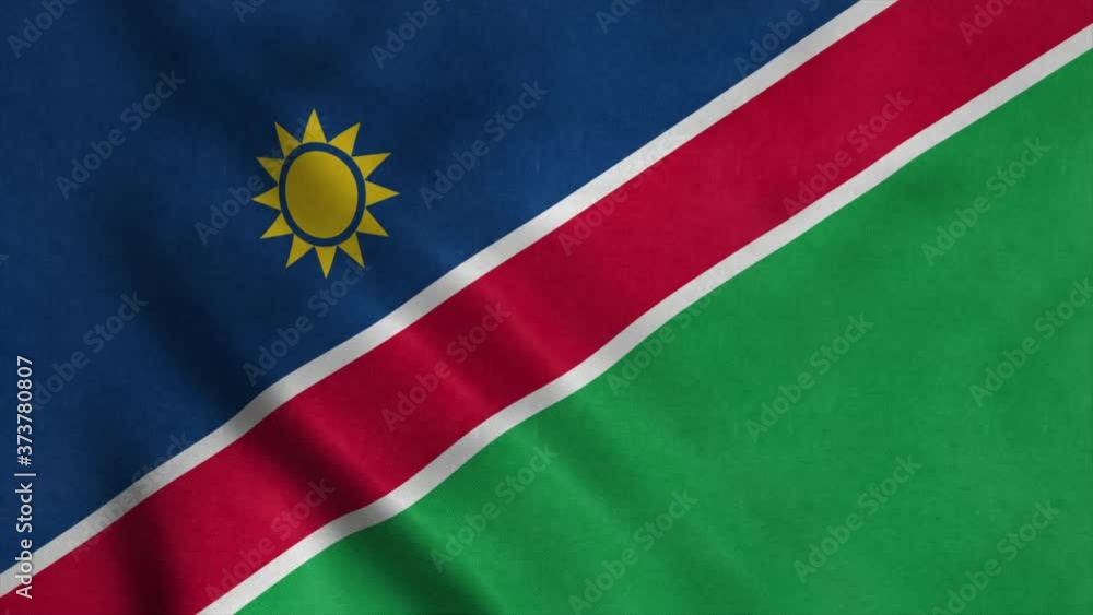 Namibia flag waving in the wind. National flag of Namibia. Sign of ...