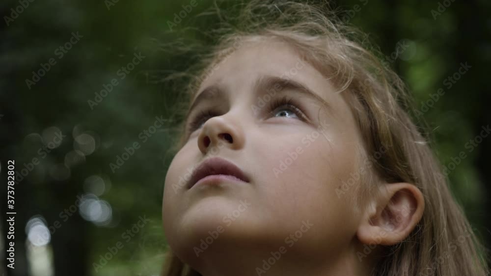 Kid Looking Up at Sky in Nature. Portrait Little Girl Praying Looking ...
