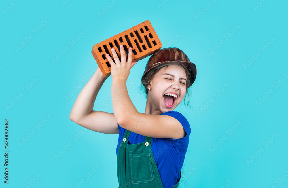 oh no. Little girl bricklayer. learning how to build. Little worker in ...