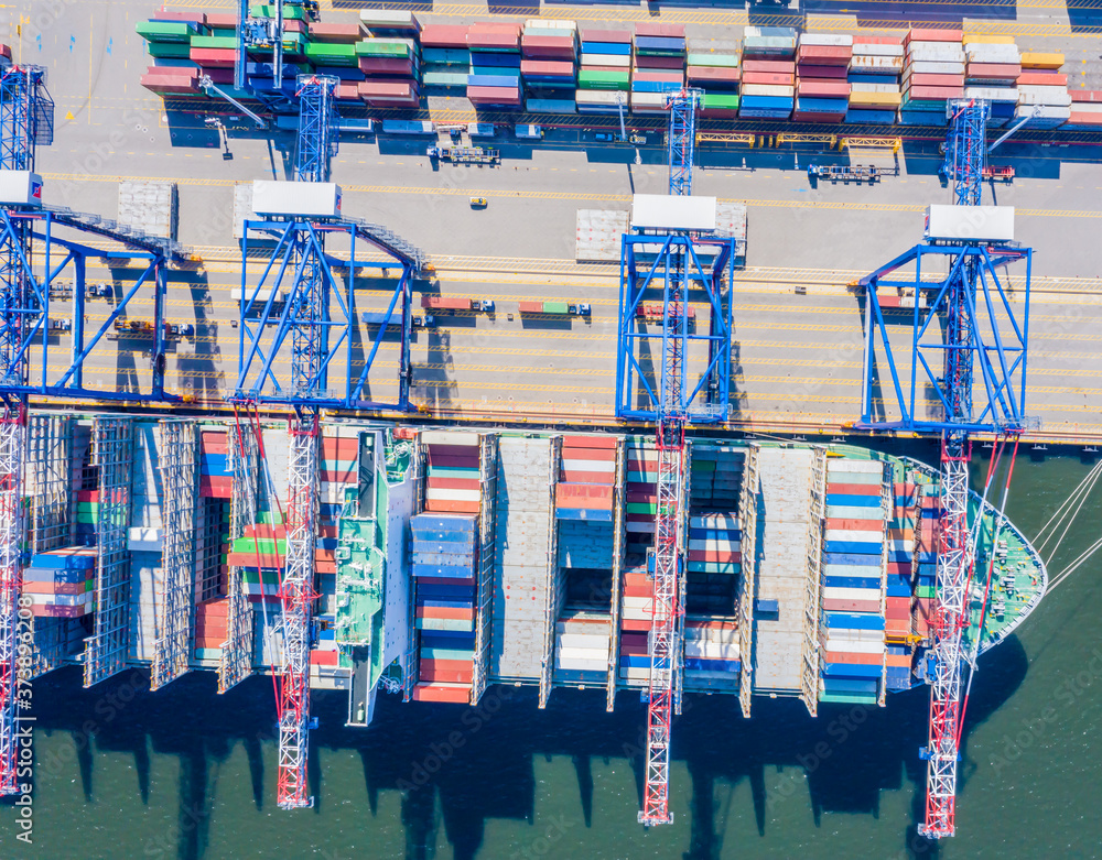 Container ship loading at port with crane, container ship carrying ...