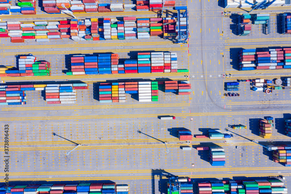 Container ship loading at port with crane, container ship carrying ...