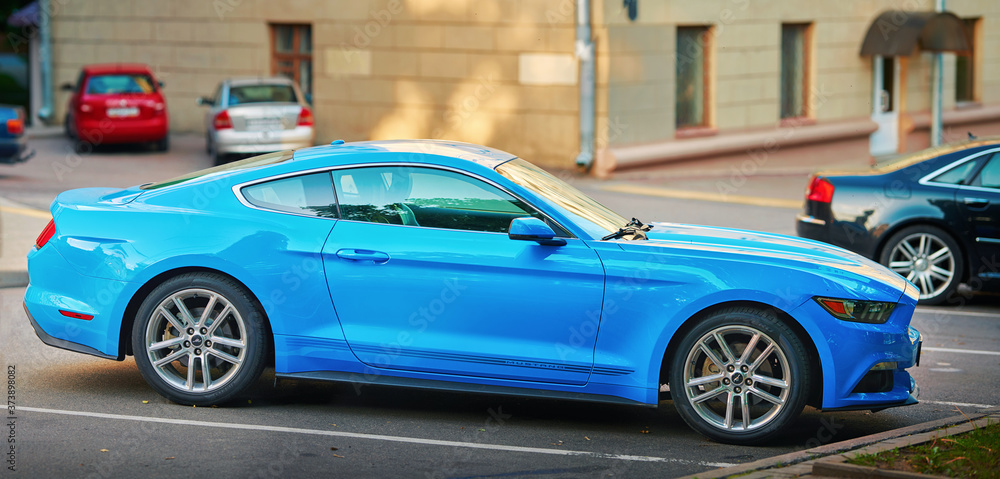 Minsk, Belarus. Jun 2020. Blue muscle car Ford Mustang at city street ...