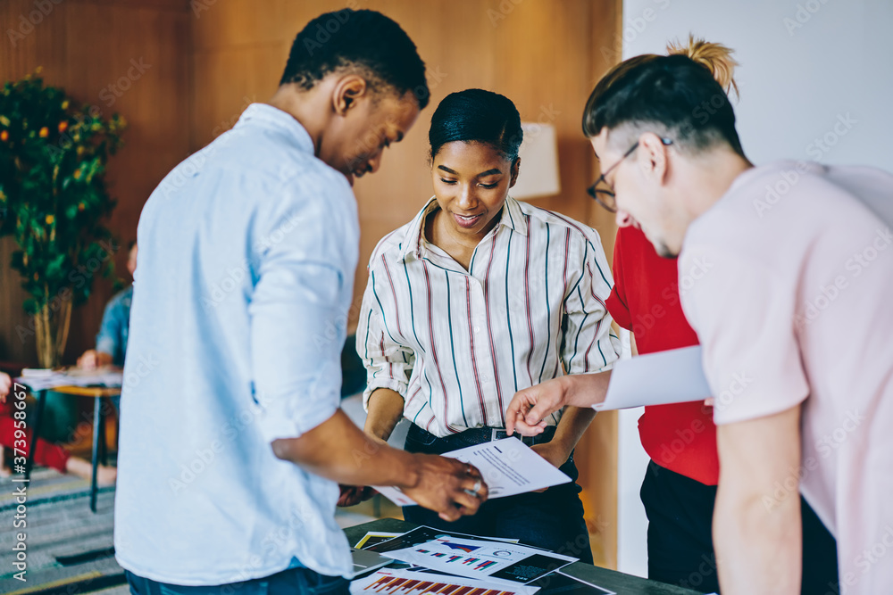 Multiracial people discussing creative ideas for developing startup ...