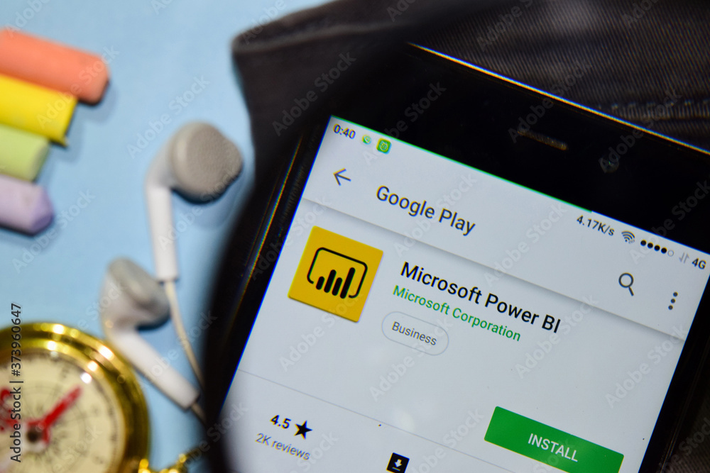 Microsoft Power BI dev app with magnifying on Smartphone screen ...