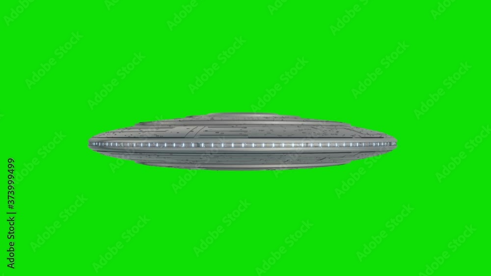 UFO transition on green screen. Alien flying saucer isolated on green ...