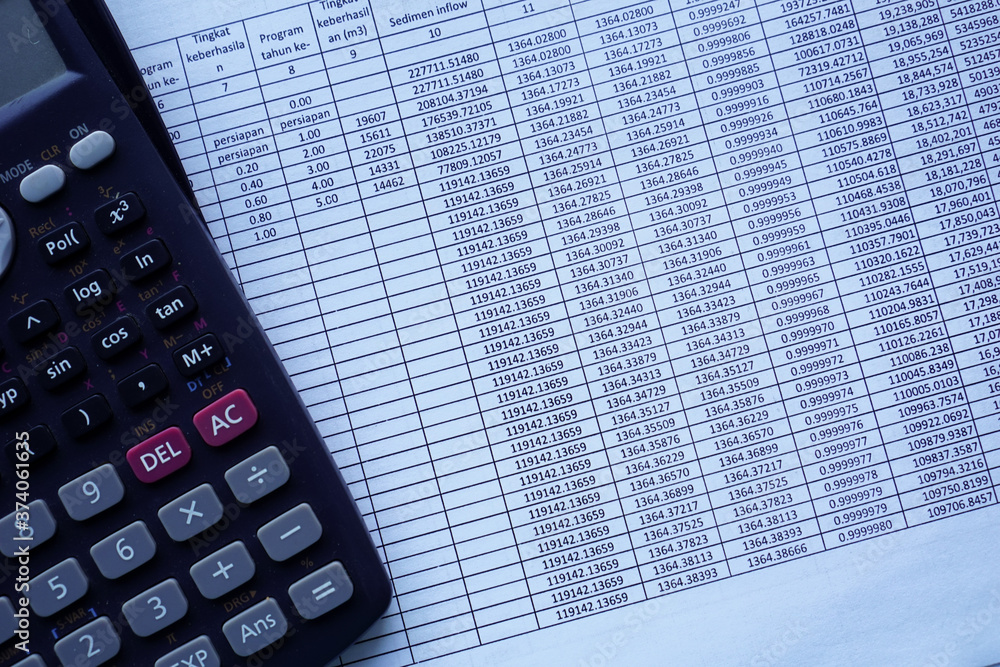 accountant data spreadsheet with calculator. business accounter ...