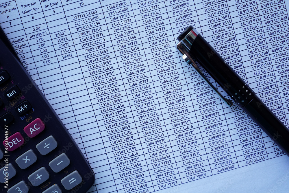 accountant data spreadsheet with calculator. business accounter ...