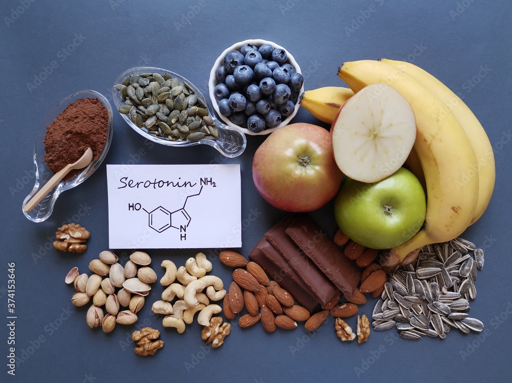 Serotonin-boosting foods. Assortment of food for good mood and ...