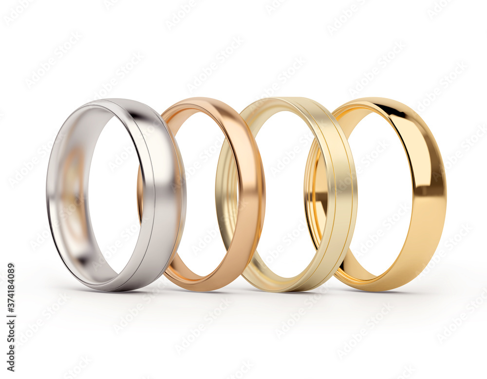 Gold rings in white and yellow gold in a horizontal format, one next to ...