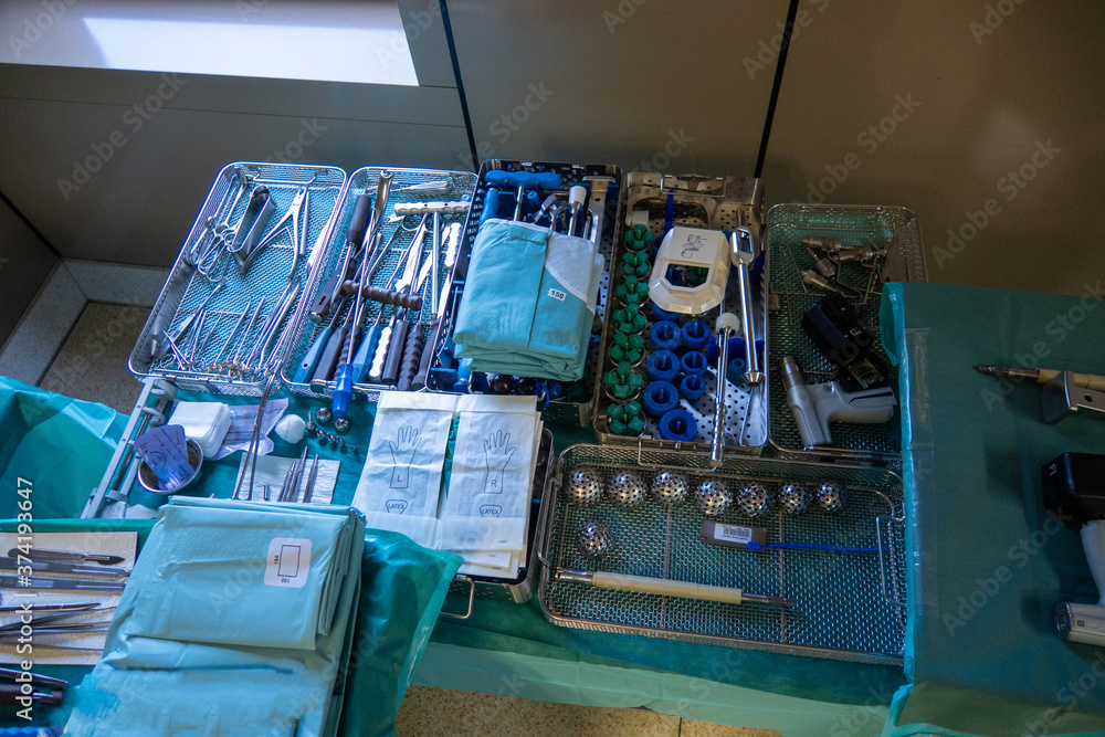 in operating room there are many instruments for performing a hip ...