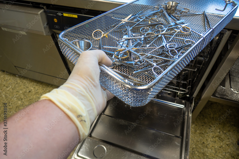 in sterilization department of a hospital, surgical instruments are ...