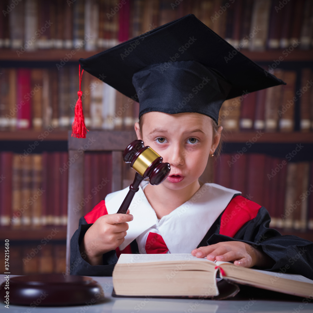 Humorous portrait of cute little child girl as a judge. Stock Photo ...