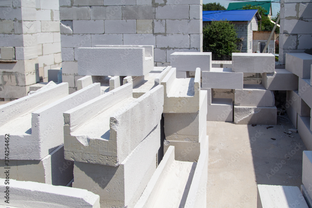 Construction of the walls of the house from foam concrete bricks. Stock ...