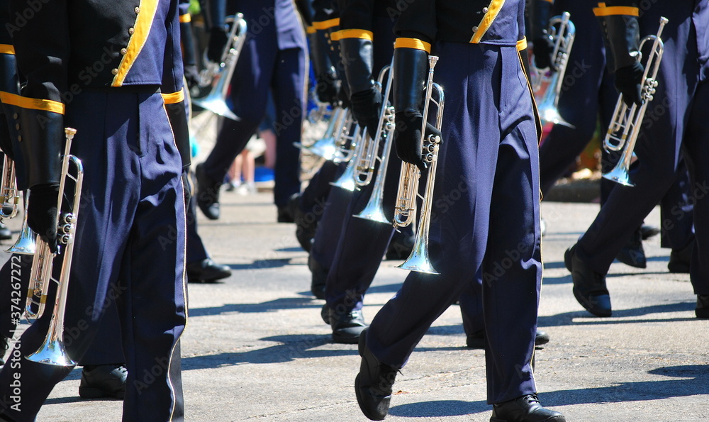 Marching band in a parade outdoors. Stock Photo | Adobe Stock