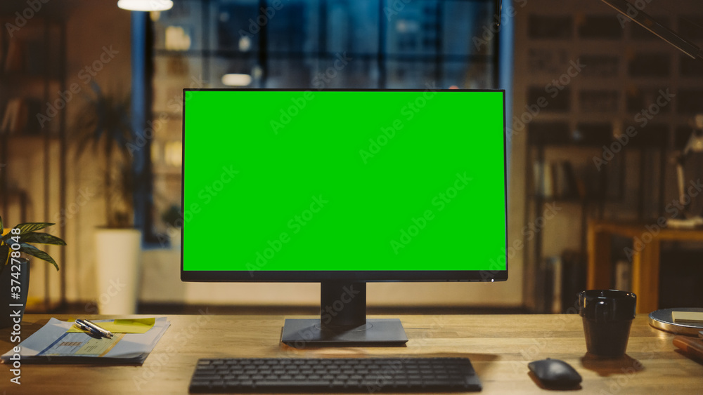 Desktop Computer with Mock-up Green Screen Standing on the Wooden Desk ...