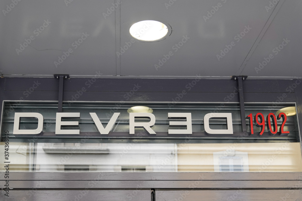 Devred 1902 logo and text sign front of men store fashion clothing ...