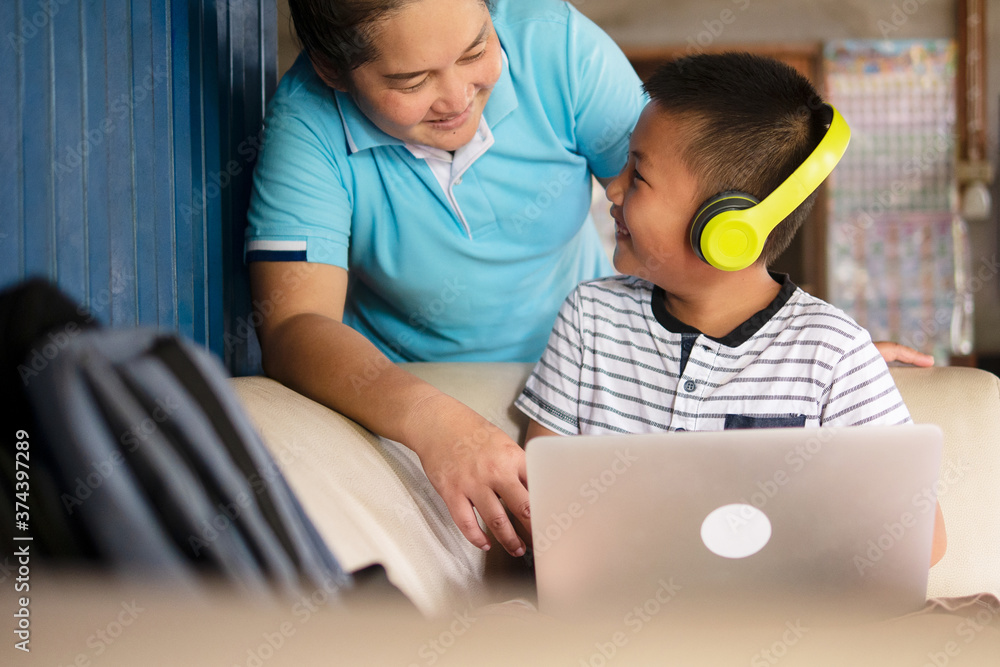 Online remote learning and homeschooling education concepts. School kid ...