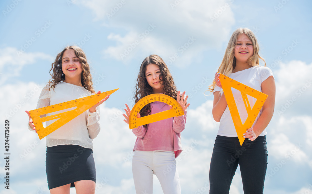Foto de Education concept. School students learning geometry. Girls ...