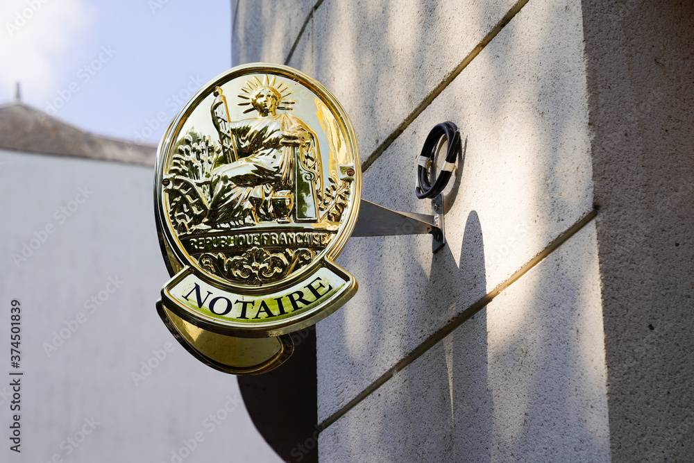 Notaire golden copper plate french sign text and logo of notary office ...