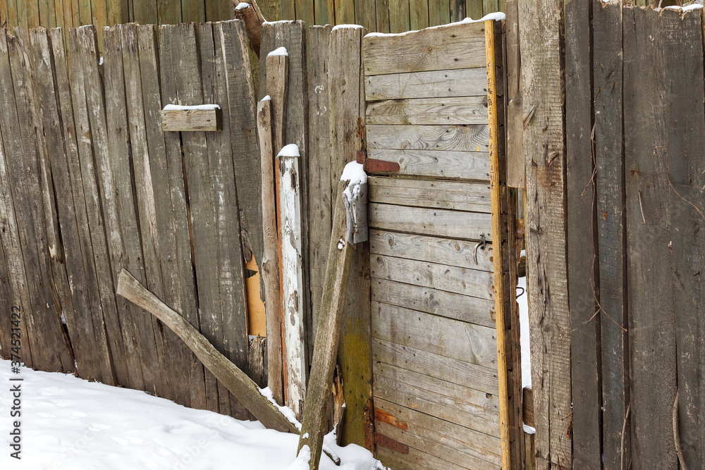 Texture of weathered wooden wall. Falling snow, in winter. Aged wooden ...