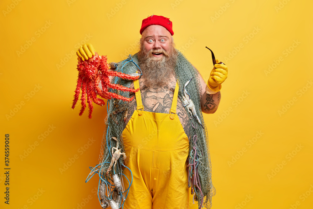 Marine adventure, occupation concept. Happy bearded sailor shows what ...