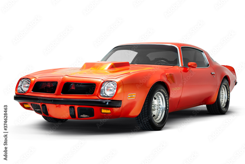Orange colored Side front view of a 1974 Pontiac Trans Am Brand muscle ...