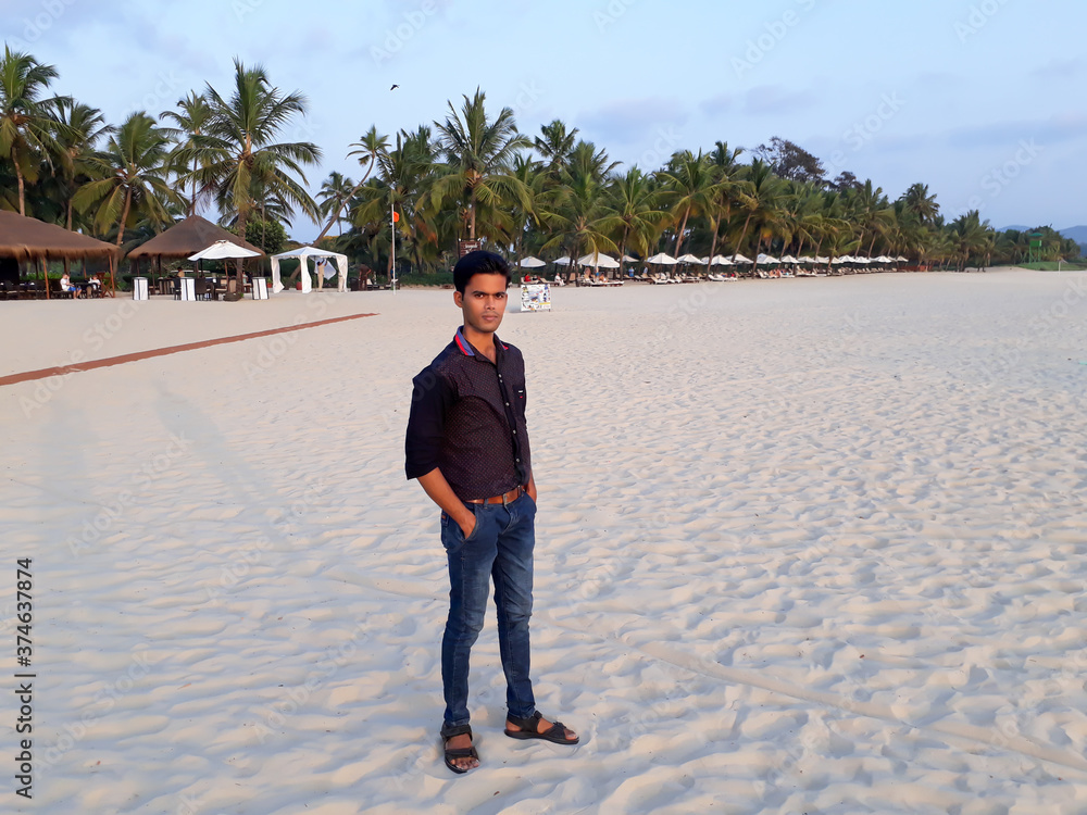Young Indian men in the beach, Indian fashion, young Indian boy on the ...