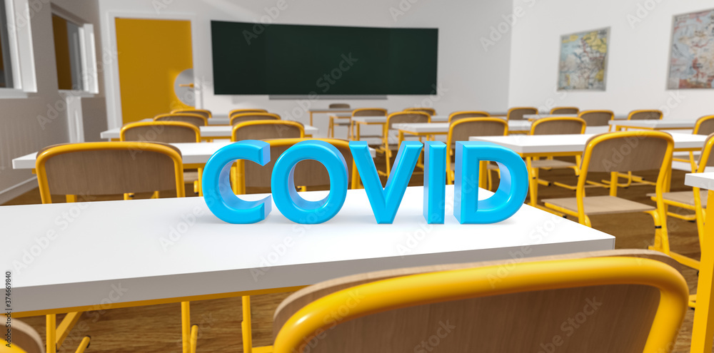 mot COVID écrit sur un bureau dans une salle de classe vide Stock ...