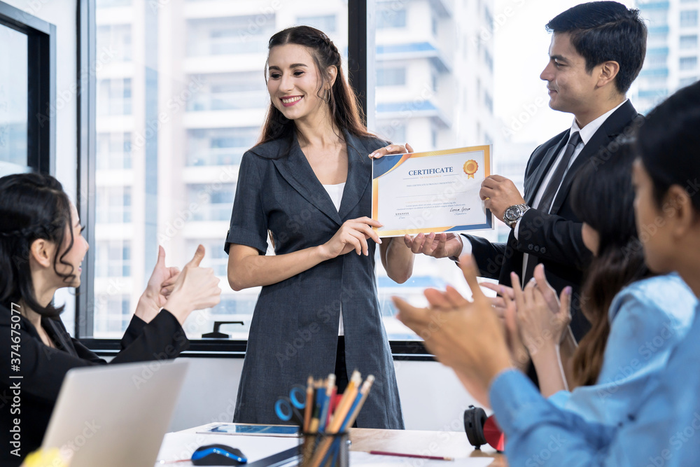 Business executives congratulate employees on their excellent work ...