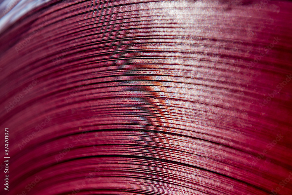 Curved lines of rolled metal are made of sheet steel. Stock Photo ...