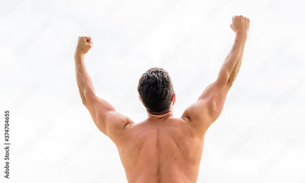 completely successful. Morning stretching. Man muscular back stretching ...