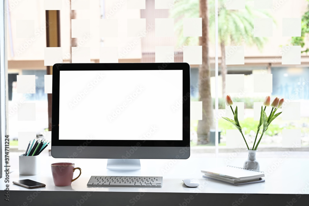 Workspace computer monitor with a white blank screen is putting on a ...