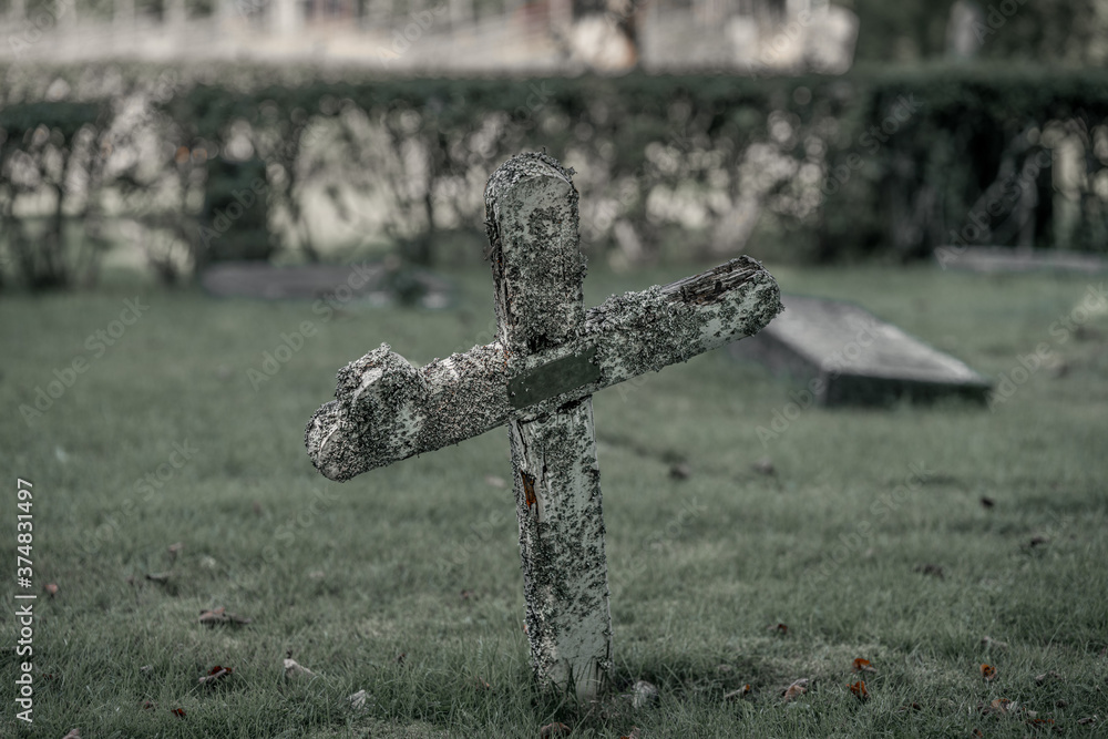 Old skewed and tilted wooden cross at an old cemetery in Sweden Stock ...