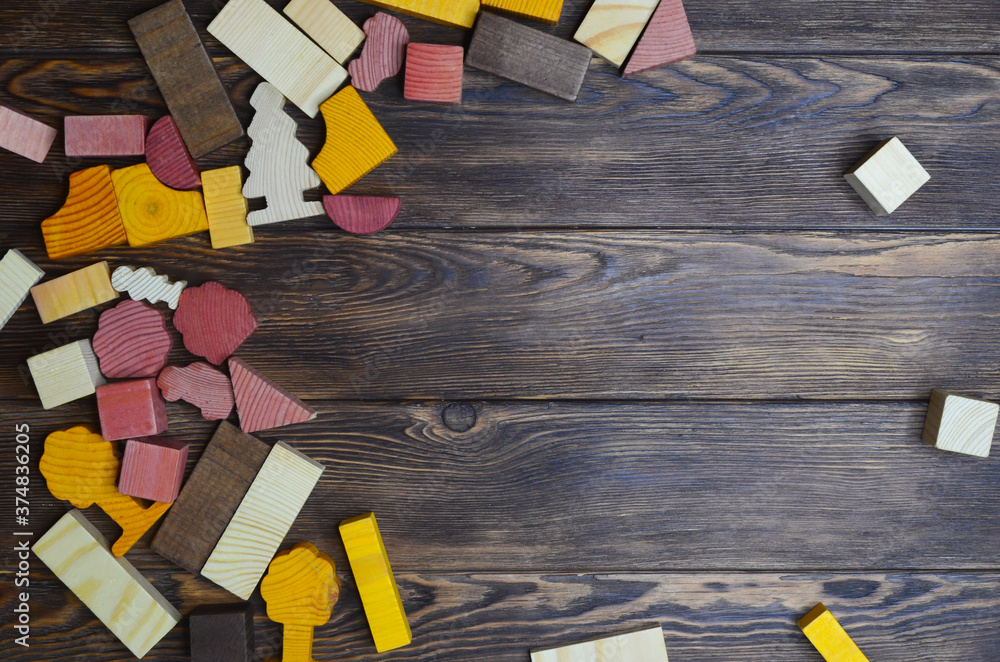 Children's wooden construction kit in the form of geometric shapes with ...