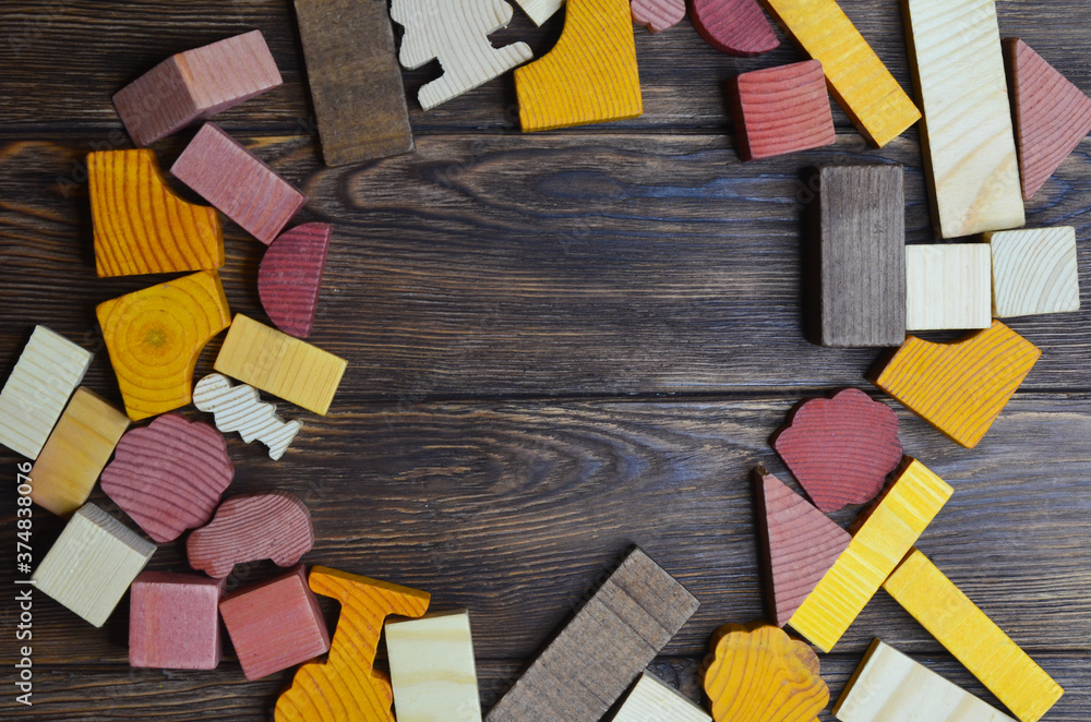 Children's wooden construction kit in the form of geometric shapes with ...