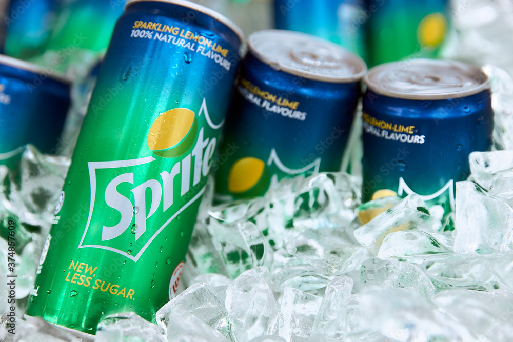 Cold sprite cans on the ice. Brand of soft drink, created by the Coca ...