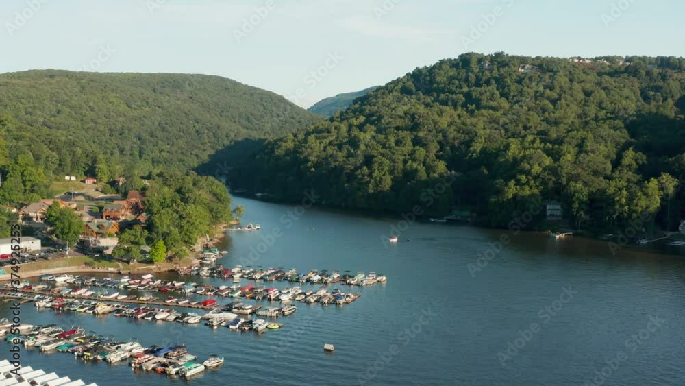 Zoom towards the Cheat River entering the lake by marina on Cheat Lake ...