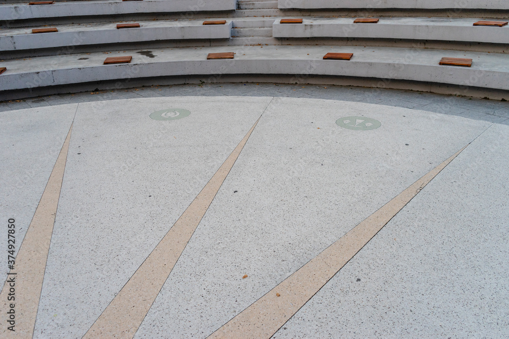 Architectural outdoor amphitheater detail with rays on the floor and ...