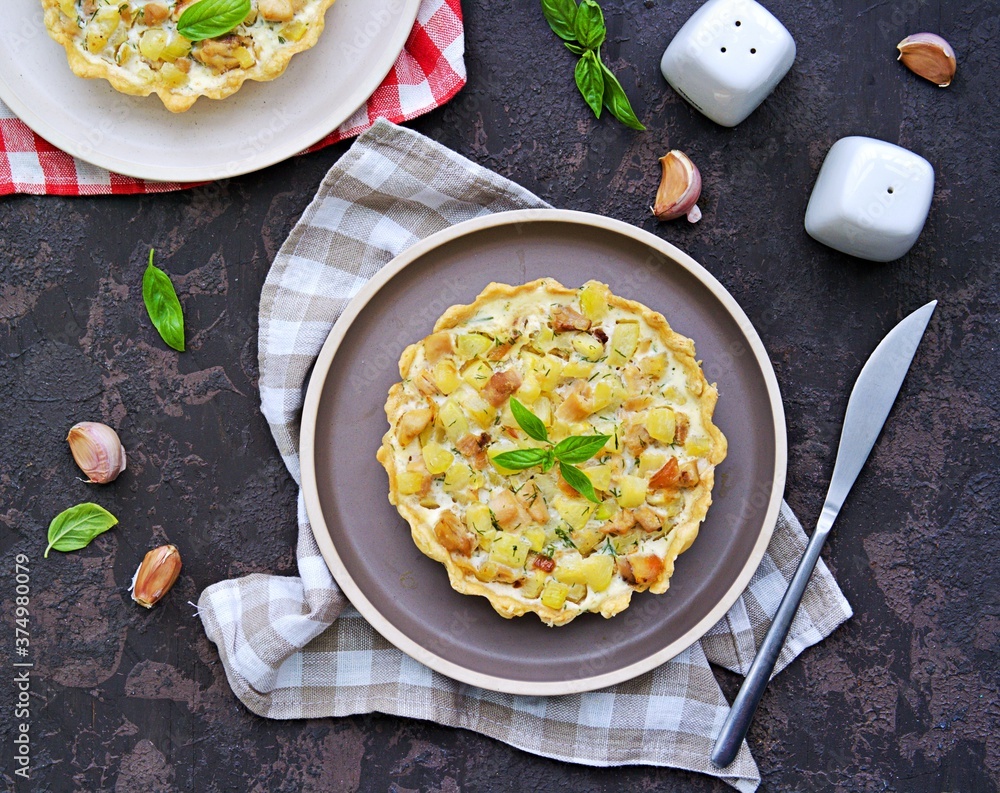 Portion mini tart with chicken, zucchini and fried onions on shortcrust ...