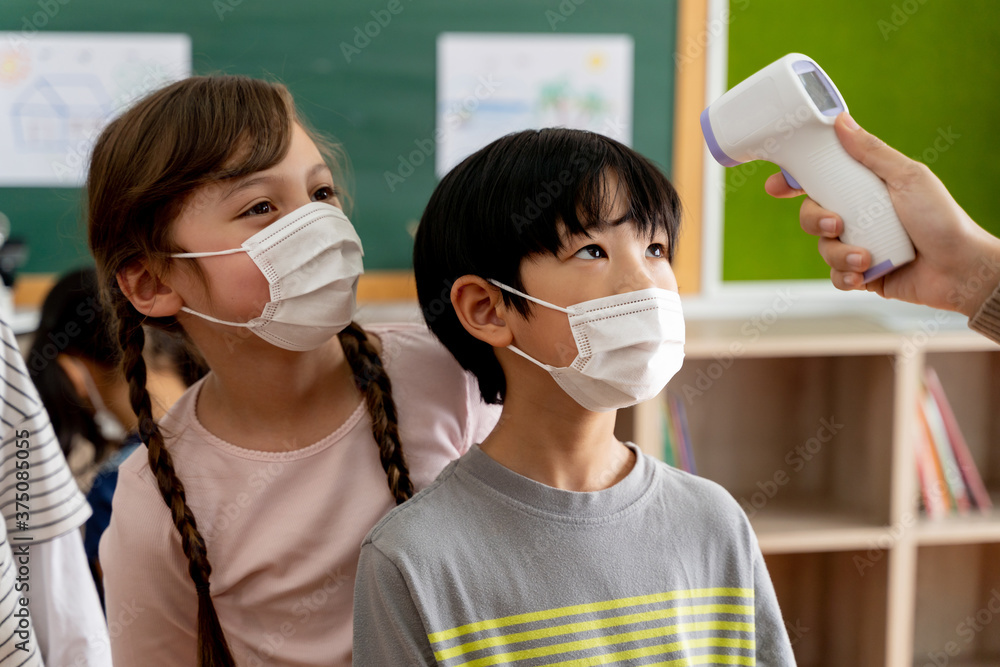 Group diverse students in school building checked and scanned for ...
