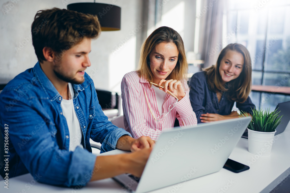Group of young people working together. Creative business people in ...
