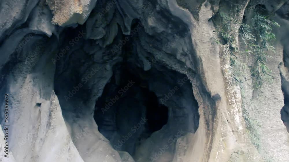 Entrance to the erotic cave. The entrance resembles an open vulva, and the arch and walls of the ...