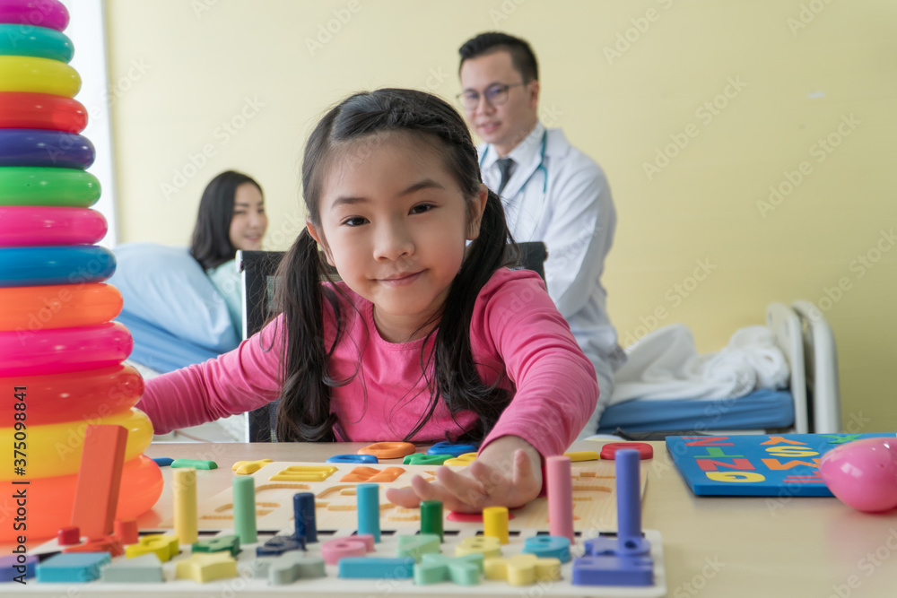 Preschool girls doing activities for children Stock Photo | Adobe Stock