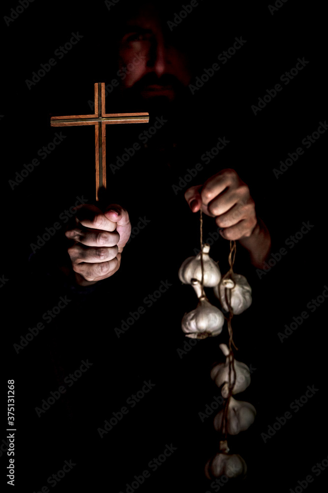 Vampire Holding Cross