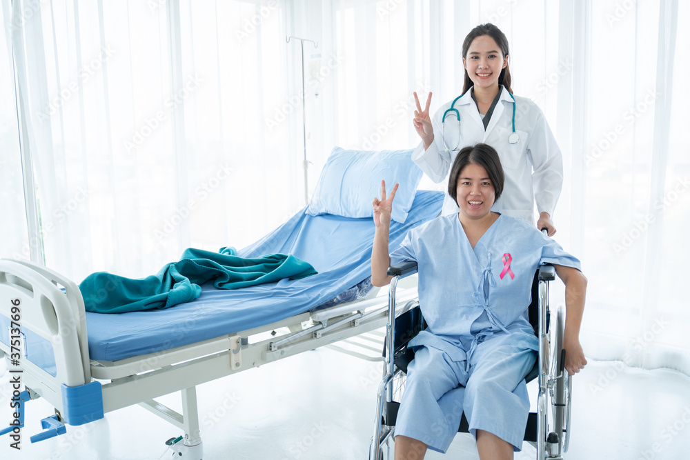 Healthcare and cancer treatment concept.Asian woman doctor and female ...